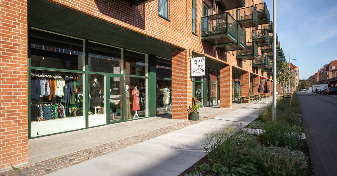 New Aarhus district has a new building with an inviting colonnade to ...